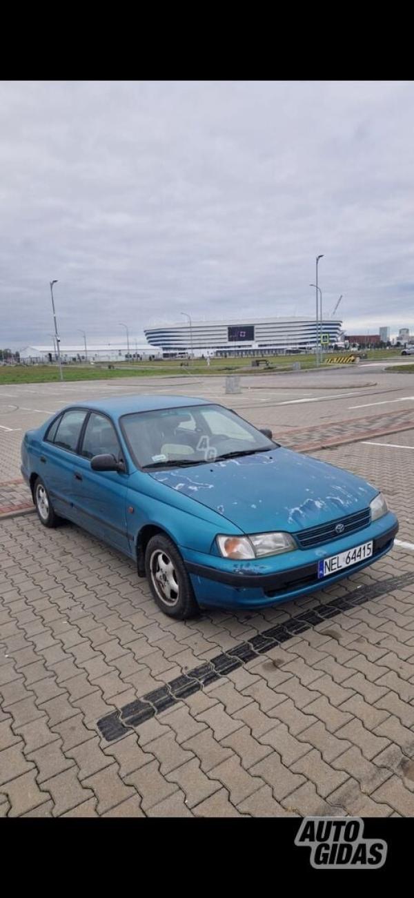 Toyota Carina 1996 in Marijampole, with an engine capacity of 1.60 L and mileage of 241 thousand km for 1499 €, photo 6 on AUTOMOTO.COM.LV