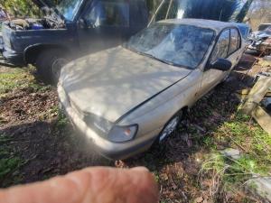 Yellow Toyota Carina 1992 in Riga, with an engine capacity of 1.60 L and mileage of 240 thousand km for 1000 €, photo 3 on AUTOMOTO.COM.LV