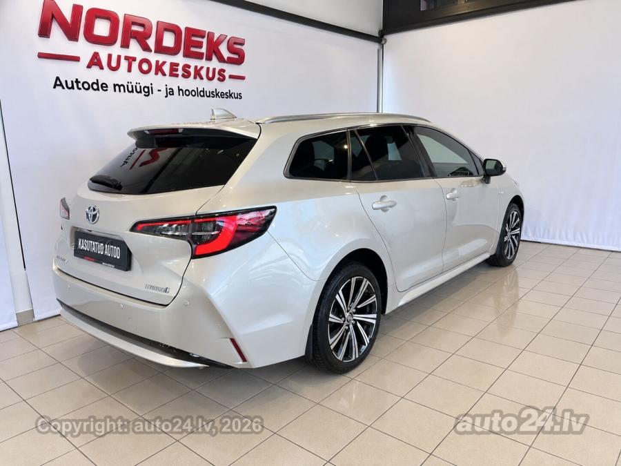 Beige Toyota Corolla 2021 in Tallinn, with an engine capacity of 1.80 L and mileage of 145 thousand km for 18290 €, photo 3 on AUTOMOTO.COM.LV