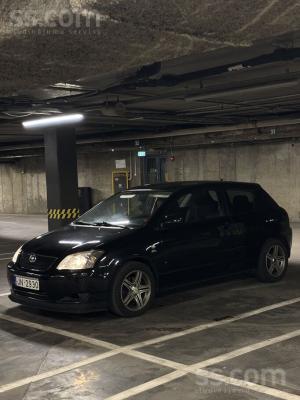 Black Toyota Corolla 2002 in Riga, with an engine capacity of 2.00 L and mileage of 339 thousand km for 1300 €, photo 9 on AUTOMOTO.COM.LV