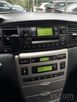 Black Toyota Corolla 2002 in Riga, with an engine capacity of 2.00 L and mileage of 339 thousand km for 1300 €, photo 11 on AUTOMOTO.COM.LV