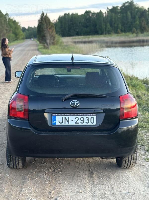 Toyota Corolla 2002 Rīga vietnē Melns Toyota Corolla 2002 Rīga, ar dzinēja tilpumu 2.00 L un nobraukumu 340 tūkst. km par 550 €, foto 5 vietnē AUTOMOTO.COM.LV