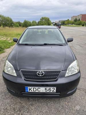 Black Toyota Corolla 2004 in Siauliai, with an engine capacity of 1.40 L and mileage of 223 thousand km for 650 €, photo 6 on AUTOMOTO.COM.LV