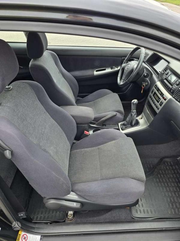 Melns Toyota Corolla 2004 Šauļi, ar dzinēja tilpumu 1.40 L un nobraukumu 223 tūkst. km par 650 €, foto 7 vietnē AUTOMOTO.COM.LV