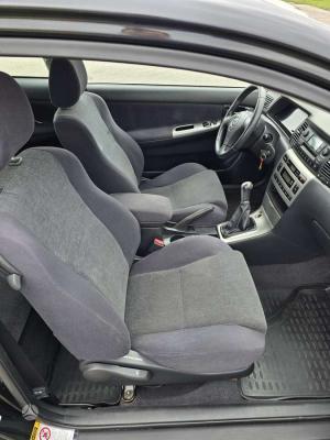 Black Toyota Corolla 2004 in Siauliai, with an engine capacity of 1.40 L and mileage of 223 thousand km for 650 €, photo 8 on AUTOMOTO.COM.LV
