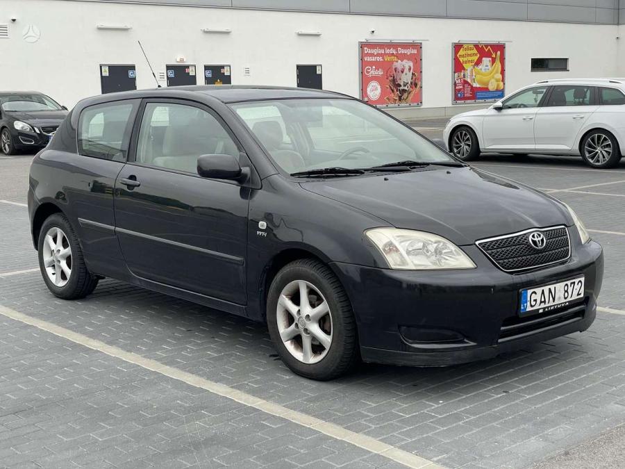Black Toyota Corolla 2003 in Kaunas, with an engine capacity of 1.60 L and mileage of 284 thousand km for 650 €, photo 4 on AUTOMOTO.COM.LV