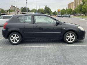 Black Toyota Corolla 2003 in Kaunas, with an engine capacity of 1.60 L and mileage of 284 thousand km for 650 €, photo 5 on AUTOMOTO.COM.LV
