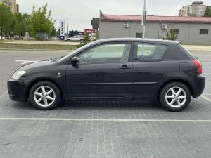 Black Toyota Corolla 2003 in Kaunas, with an engine capacity of 1.60 L and mileage of 284 thousand km for 650 €, photo 9 on AUTOMOTO.COM.LV