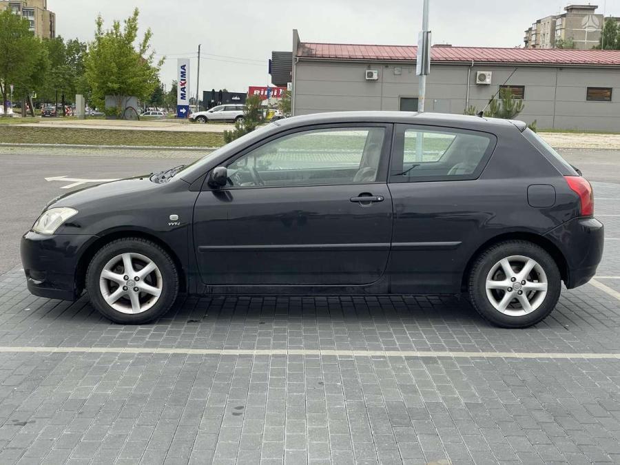 Black Toyota Corolla 2003 in Kaunas, with an engine capacity of 1.60 L and mileage of 284 thousand km for 650 €, photo 9 on AUTOMOTO.COM.LV