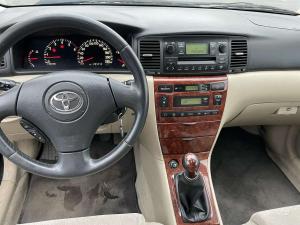 Black Toyota Corolla 2003 in Kaunas, with an engine capacity of 1.60 L and mileage of 284 thousand km for 650 €, photo 11 on AUTOMOTO.COM.LV