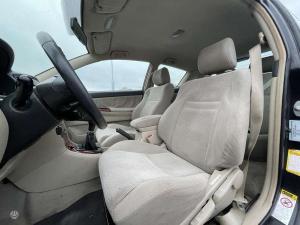Black Toyota Corolla 2003 in Kaunas, with an engine capacity of 1.60 L and mileage of 284 thousand km for 650 €, photo 12 on AUTOMOTO.COM.LV