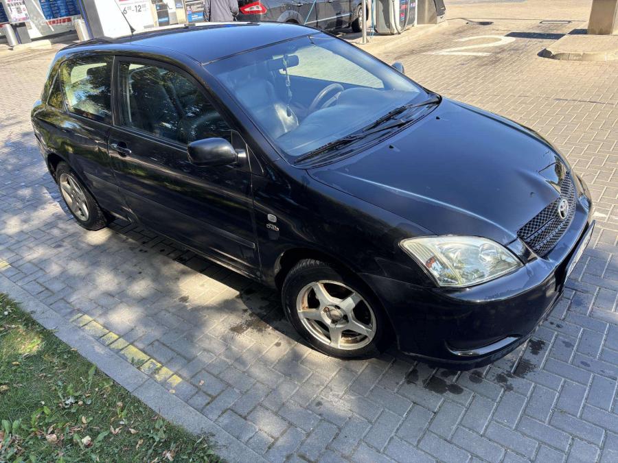Black Toyota Corolla 2003 in Kaunas, with an engine capacity of 1.90 L and mileage of 347 thousand km for 410 €, photo 1 on AUTOMOTO.COM.LV