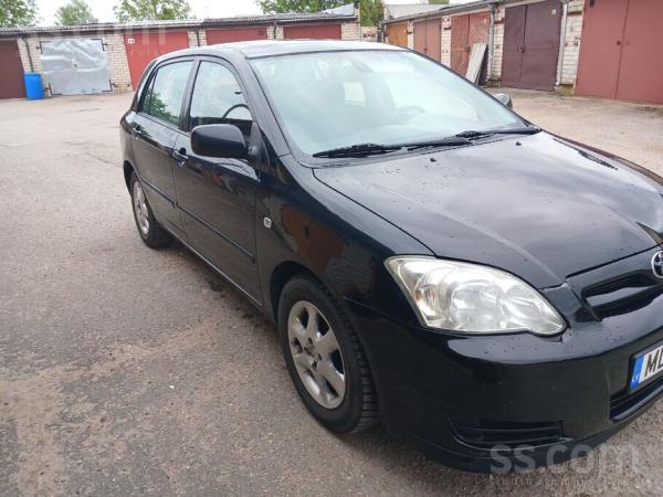 Black Toyota Corolla 2005 in Jelgava, with an engine capacity of 2.00 L and mileage of 330 thousand km for 1300 €, photo 10 on AUTOMOTO.COM.LV