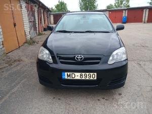 Black Toyota Corolla 2005 in Jelgava, with an engine capacity of 2.00 L and mileage of 330 thousand km for 1300 €, photo 12 on AUTOMOTO.COM.LV