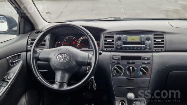 Black Toyota Corolla 2005 in Riga, with an engine capacity of 1.40 L and mileage of 0 thousand km for 1150 €, photo 9 on AUTOMOTO.COM.LV