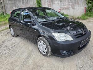 Melns Toyota Corolla 2005 Viļņa, ar dzinēja tilpumu 2.00 L un nobraukumu 420 tūkst. km par 999 €, foto  vietnē AUTOMOTO.COM.LV