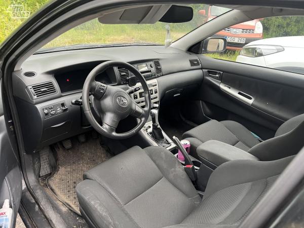 Black Toyota Corolla 2005 in Vilnius, with an engine capacity of 1.60 L and mileage of 237 thousand km for 450 €, photo 4 on AUTOMOTO.COM.LV