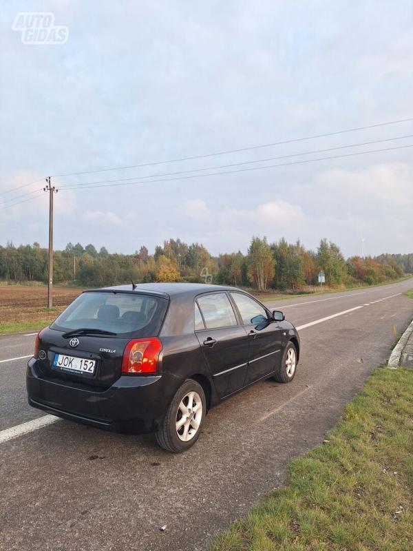 Black Toyota Corolla 2005 in Telschi, with an engine capacity of 2.00 L and mileage of 329 thousand km for 1600 €, photo 8 on AUTOMOTO.COM.LV