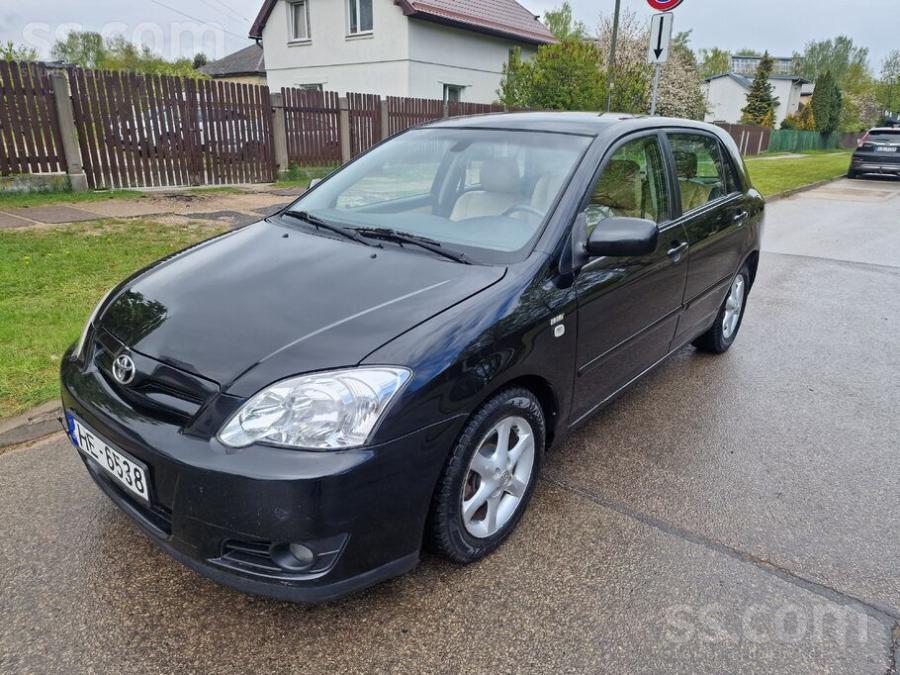 Melns Toyota Corolla 2006 Rīga, ar dzinēja tilpumu 1.40 L un nobraukumu 252 tūkst. km par 2200 €, foto 1 vietnē AUTOMOTO.COM.LV