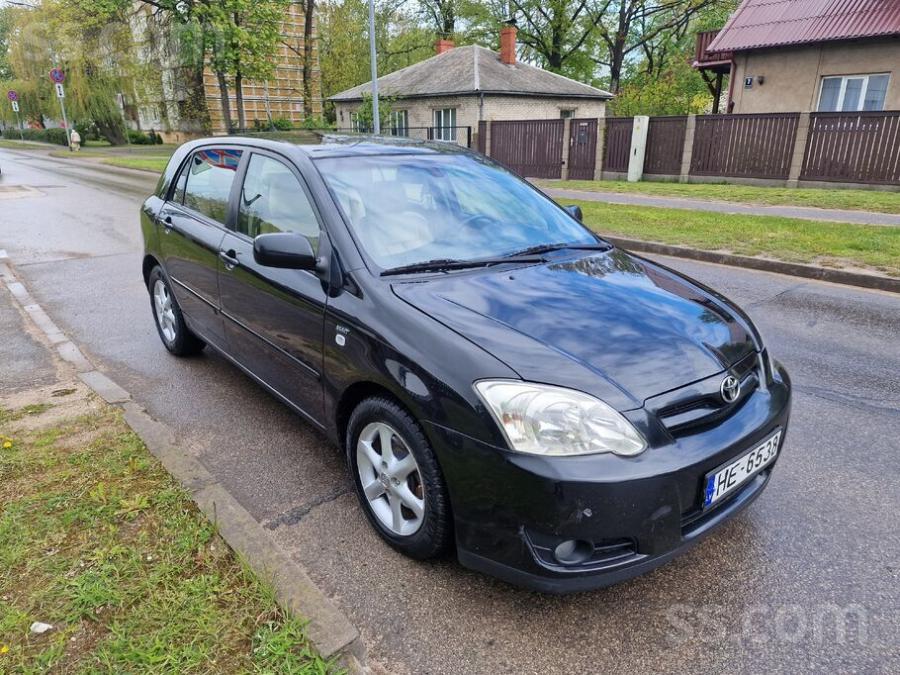 Melns Toyota Corolla 2006 Rīga, ar dzinēja tilpumu 1.40 L un nobraukumu 252 tūkst. km par 2200 €, foto 2 vietnē AUTOMOTO.COM.LV