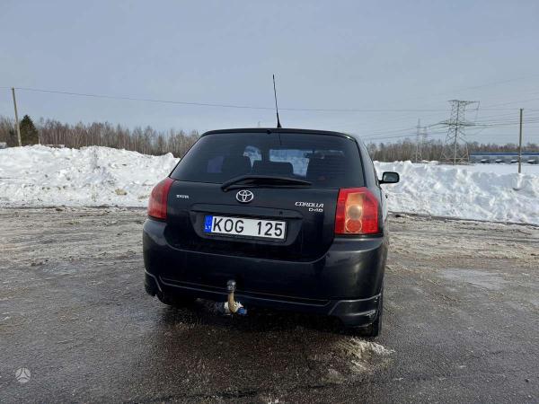 Black Toyota Corolla 2006 in Panevezys, with an engine capacity of 2.00 L and mileage of 212 thousand km for 1350 €, photo 6 on AUTOMOTO.COM.LV