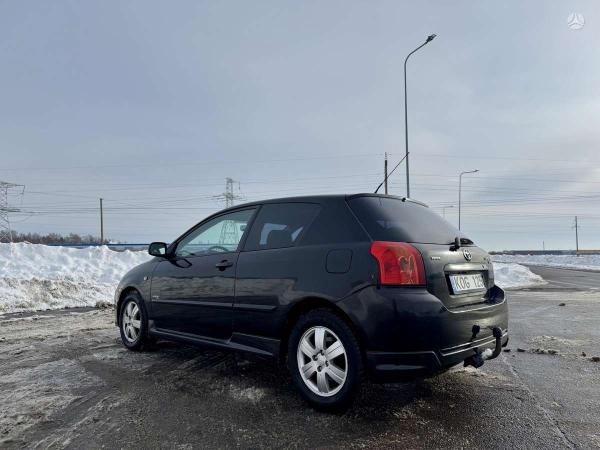 Black Toyota Corolla 2006 in Panevezys, with an engine capacity of 2.00 L and mileage of 212 thousand km for 1350 €, photo 8 on AUTOMOTO.COM.LV
