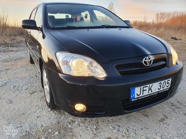 Black Toyota Corolla 2006 in Siauliai, with an engine capacity of 1.40 L and mileage of 230 thousand km for 1850 €, photo 2 on AUTOMOTO.COM.LV