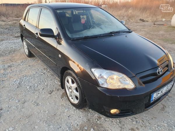 Black Toyota Corolla 2006 in Siauliai, with an engine capacity of 1.40 L and mileage of 230 thousand km for 1850 €, photo 3 on AUTOMOTO.COM.LV