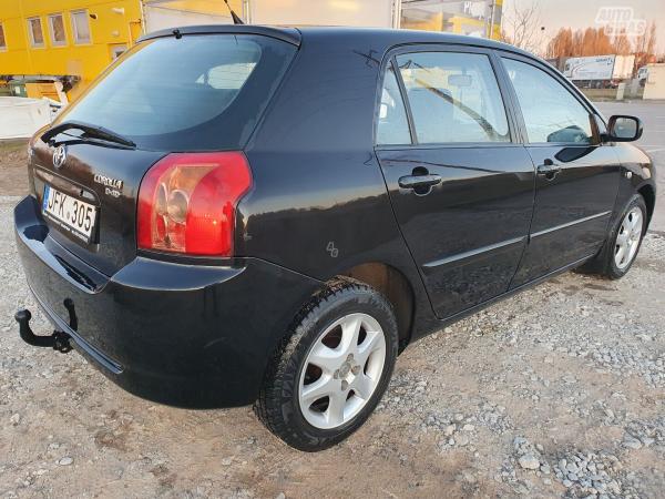 Black Toyota Corolla 2006 in Siauliai, with an engine capacity of 1.40 L and mileage of 230 thousand km for 1850 €, photo 4 on AUTOMOTO.COM.LV