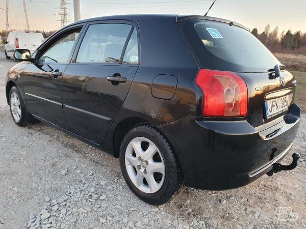 Black Toyota Corolla 2006 in Siauliai, with an engine capacity of 1.40 L and mileage of 230 thousand km for 1850 €, photo 8 on AUTOMOTO.COM.LV