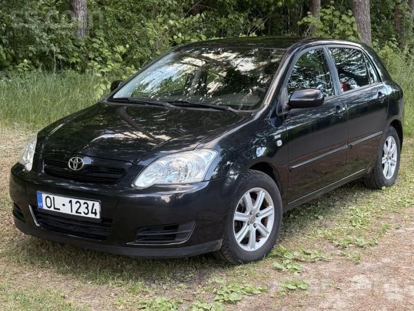 Black Toyota Corolla 2006 in Riga, with an engine capacity of 1.40 L and mileage of 236 thousand km for 2200 €, photo 1 on AUTOMOTO.COM.LV
