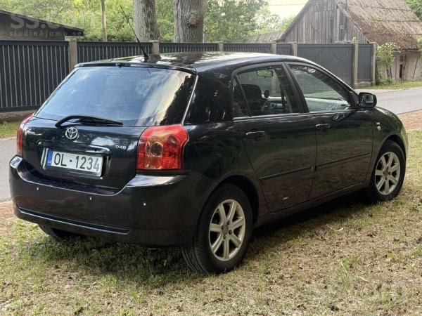 Black Toyota Corolla 2006 in Riga, with an engine capacity of 1.40 L and mileage of 236 thousand km for 2200 €, photo 3 on AUTOMOTO.COM.LV