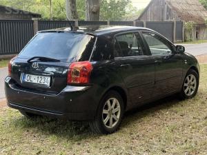 Black Toyota Corolla 2006 in Riga, with an engine capacity of 1.40 L and mileage of 236 thousand km for 2200 €, photo 4 on AUTOMOTO.COM.LV