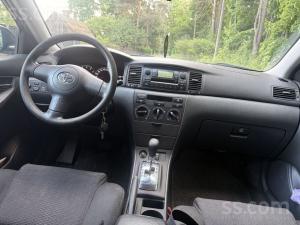 Black Toyota Corolla 2006 in Riga, with an engine capacity of 1.40 L and mileage of 236 thousand km for 2200 €, photo 6 on AUTOMOTO.COM.LV