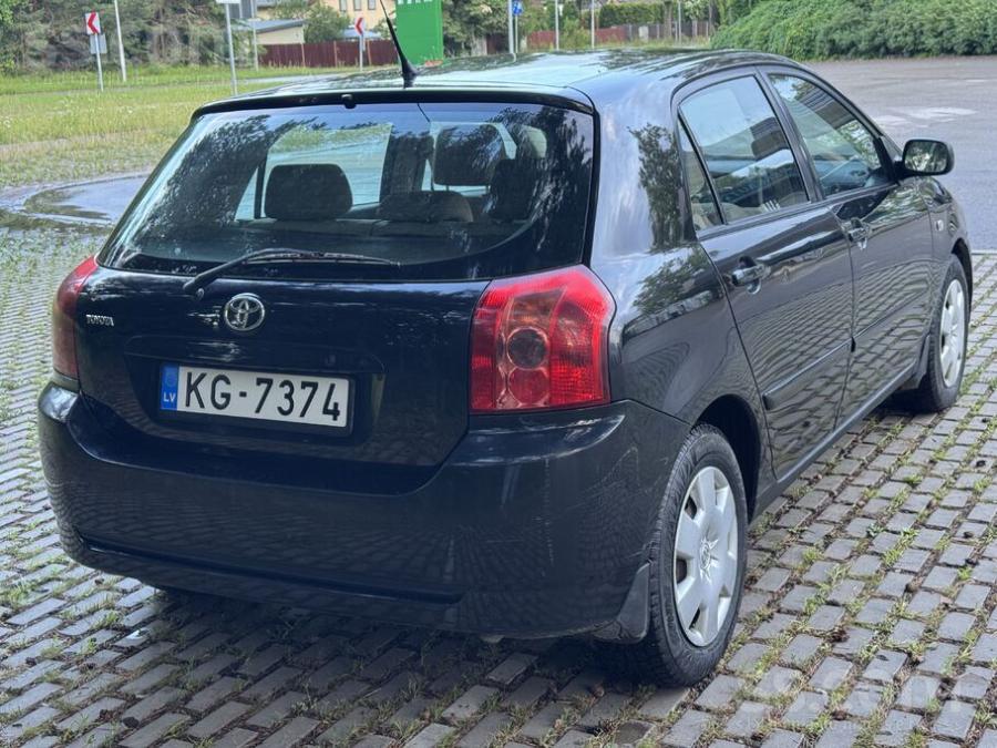 Black Toyota Corolla 2006 in Jurmala, with an engine capacity of 1.60 L and mileage of 280 thousand km for 1850 €, photo 3 on AUTOMOTO.COM.LV