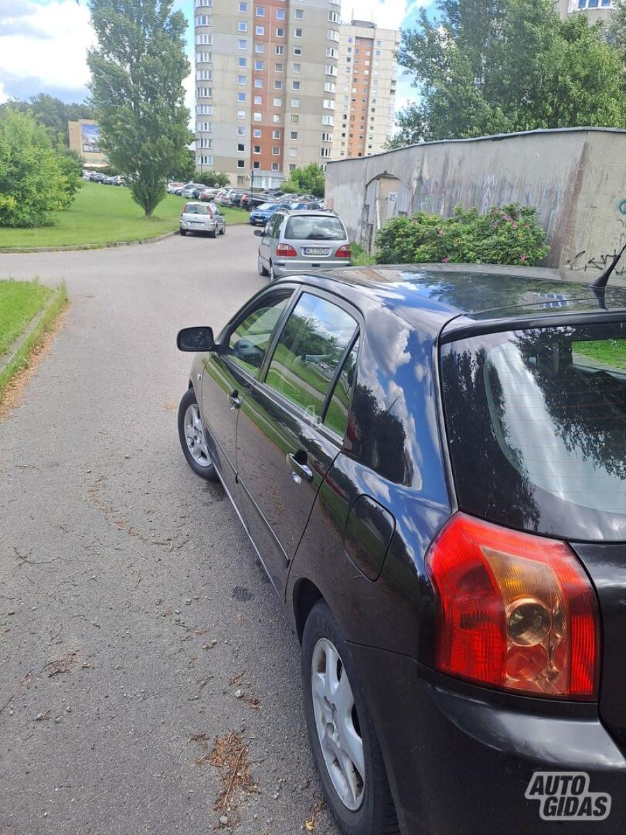 Melns Toyota Corolla 2006 Viļņa, ar dzinēja tilpumu 2.00 L un nobraukumu 305 tūkst. km par 1850 €, foto 6 vietnē AUTOMOTO.COM.LV