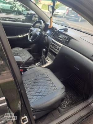Melns Toyota Corolla 2006 Viļņa, ar dzinēja tilpumu 2.00 L un nobraukumu 305 tūkst. km par 1850 €, foto 8 vietnē AUTOMOTO.COM.LV