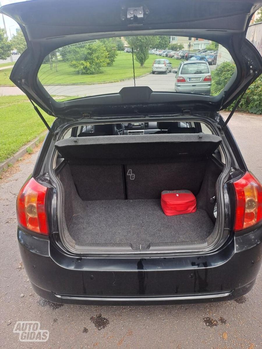 Melns Toyota Corolla 2006 Viļņa, ar dzinēja tilpumu 2.00 L un nobraukumu 305 tūkst. km par 1850 €, foto 13 vietnē AUTOMOTO.COM.LV