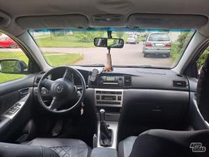 Melns Toyota Corolla 2006 Viļņa, ar dzinēja tilpumu 2.00 L un nobraukumu 305 tūkst. km par 1850 €, foto 14 vietnē AUTOMOTO.COM.LV