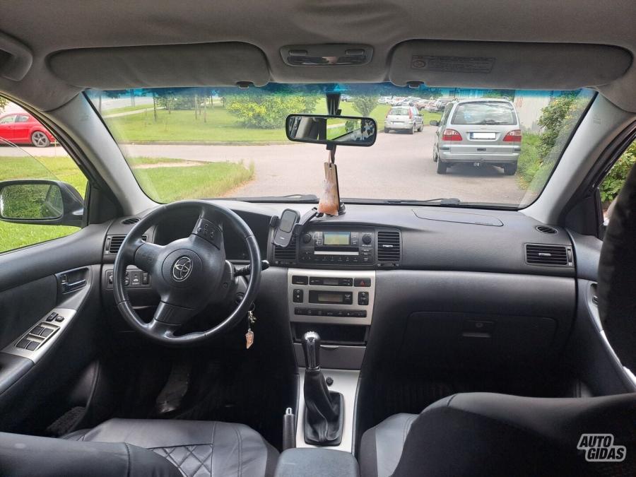 Melns Toyota Corolla 2006 Viļņa, ar dzinēja tilpumu 2.00 L un nobraukumu 305 tūkst. km par 1850 €, foto 14 vietnē AUTOMOTO.COM.LV
