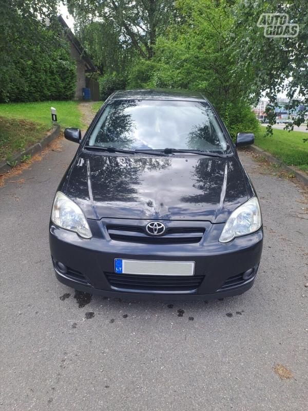 Black Toyota Corolla 2006 in Vilnius, with an engine capacity of 2.00 L and mileage of 305 thousand km for 1750 €, photo 1 on AUTOMOTO.COM.LV