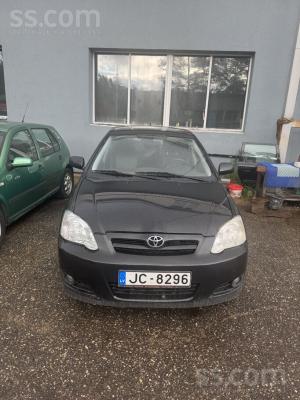 Melns Toyota Corolla 2006 Rīga, ar dzinēja tilpumu 1.40 L un nobraukumu 250 tūkst. km par 500 €, foto  vietnē AUTOMOTO.COM.LV