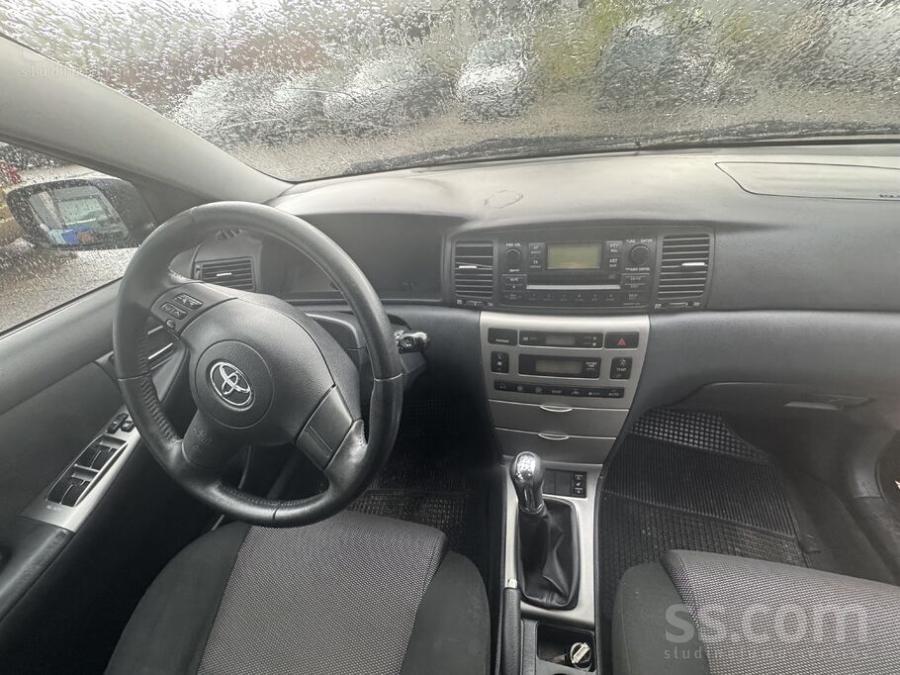 Melns Toyota Corolla 2006 Rīga, ar dzinēja tilpumu 1.40 L un nobraukumu 250 tūkst. km par 500 €, foto 7 vietnē AUTOMOTO.COM.LV