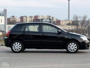 Melns Toyota Corolla 2007 Viļņa, ar dzinēja tilpumu 1.40 L un nobraukumu 180 tūkst. km par 2000 €, foto 5 vietnē AUTOMOTO.COM.LV