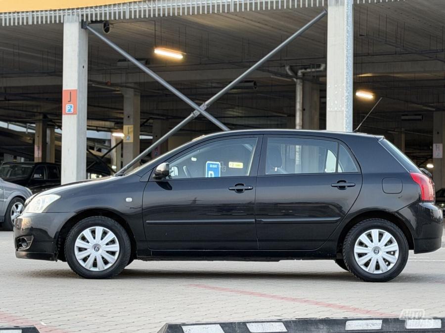 Melns Toyota Corolla 2007 Viļņa, ar dzinēja tilpumu 1.40 L un nobraukumu 180 tūkst. km par 2000 €, foto 10 vietnē AUTOMOTO.COM.LV