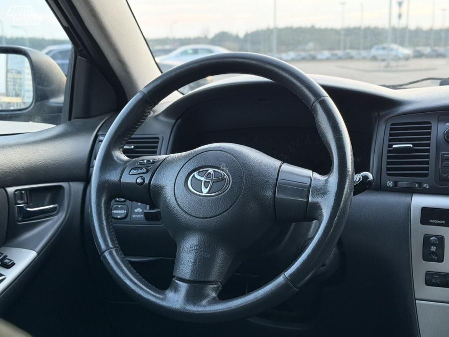 Melns Toyota Corolla 2007 Viļņa, ar dzinēja tilpumu 1.40 L un nobraukumu 180 tūkst. km par 2000 €, foto 16 vietnē AUTOMOTO.COM.LV
