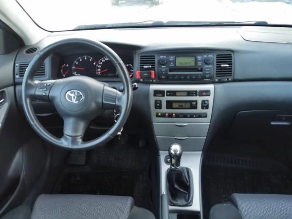 Black Toyota Corolla 2007 in Kuldiga, with an engine capacity of 1.40 L and mileage of 264 thousand km for 2200 €, photo 6 on AUTOMOTO.COM.LV