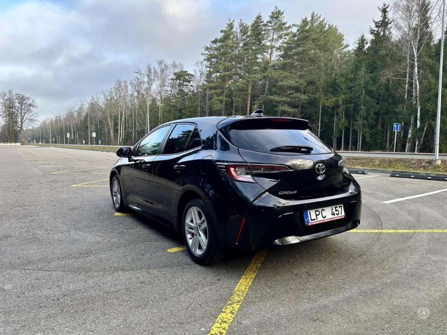 Black Toyota Corolla 2020 in Klaipeda, with an engine capacity of 1.20 L and mileage of 51 thousand km for 14950 €, photo 3 on AUTOMOTO.COM.LV