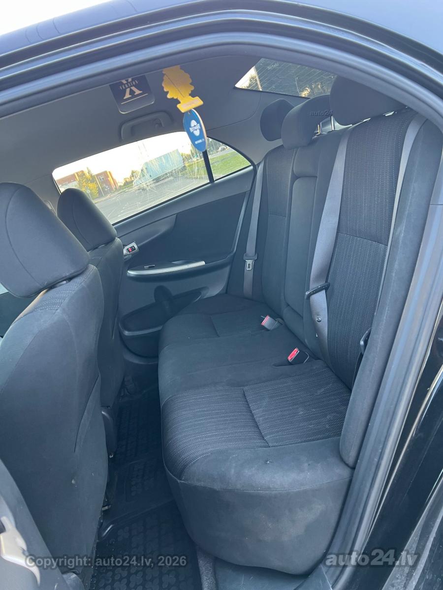 Melns Toyota Corolla 2007 Narva, ar dzinēja tilpumu 1.60 L un nobraukumu 200 tūkst. km par 2999 €, foto 17 vietnē AUTOMOTO.COM.LV