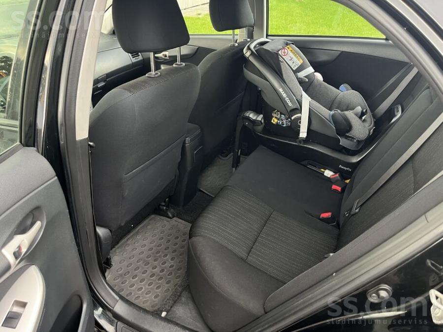 Black Toyota Corolla 2007 in Riga, with an engine capacity of 1.60 L and mileage of 382 thousand km for 2290 €, photo 9 on AUTOMOTO.COM.LV
